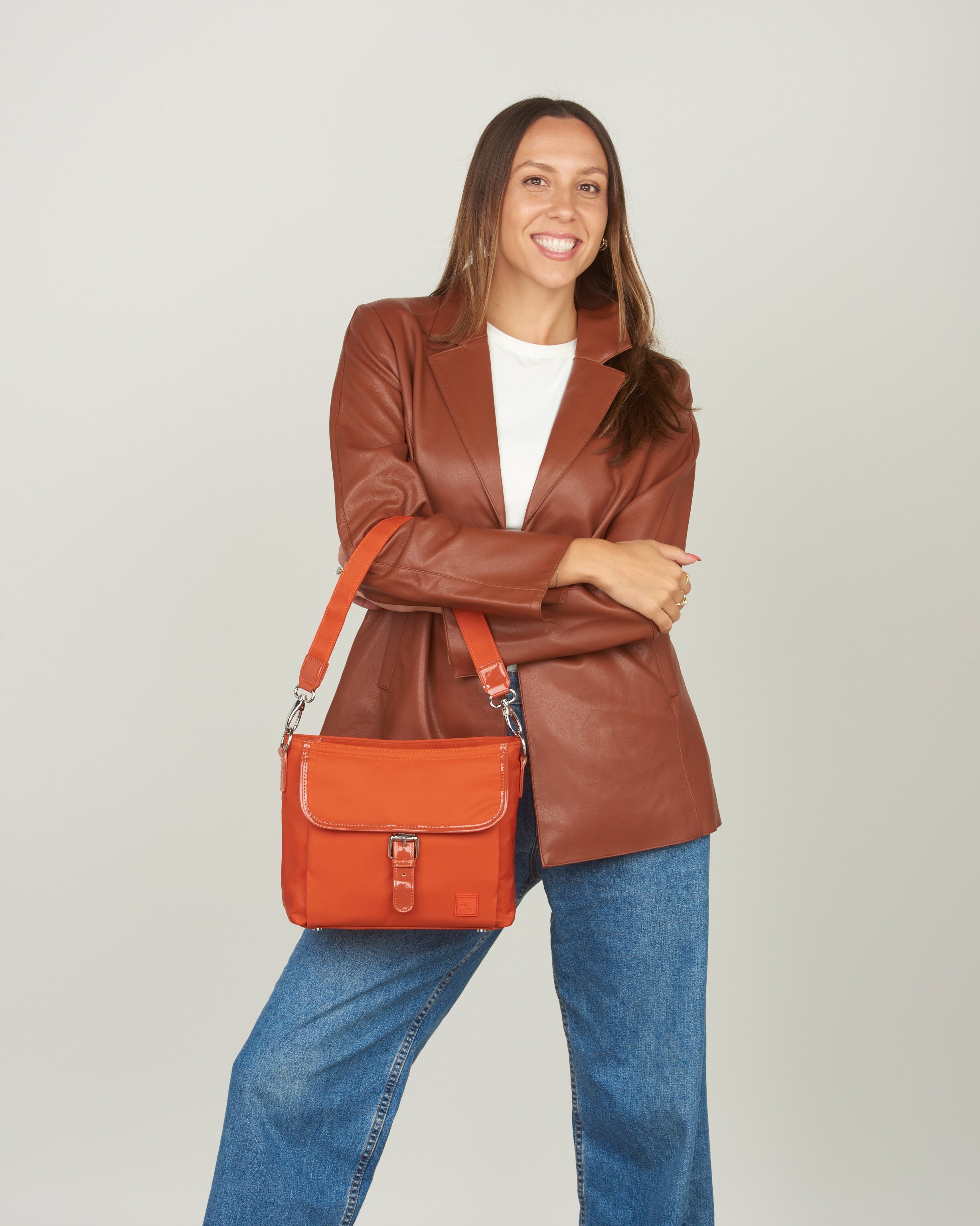 THE CONVERTIBLE BUCKLE UP SHOULDER BAG W/ CROSSBODY STRAP THE CONVERTIBLE BUCKLE UP SHOULDER BAG W/ CROSSBODY STRAP